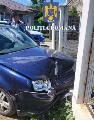 Aproape de comă alcoolică a confundat parcarea cu gardul unui imobil