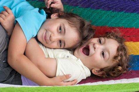 Premium Photo Portrait Of Cute Girl Lying On Bed