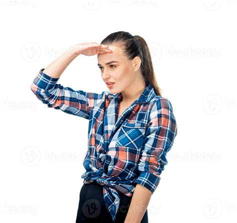 Young Female Keeps Hand Near Forehead Dark Hair Combed In Knot