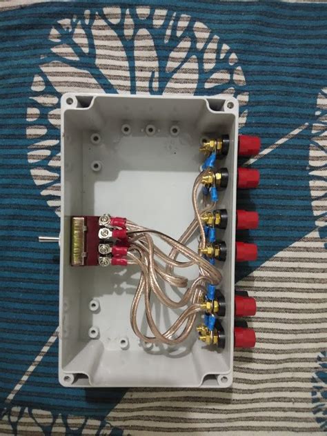 An Electrical Box With Multiple Wires And Plugs Attached To The Inside
