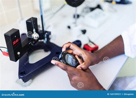Scientist With Laboratory Clock And Timer Stock Image Image Of Clock
