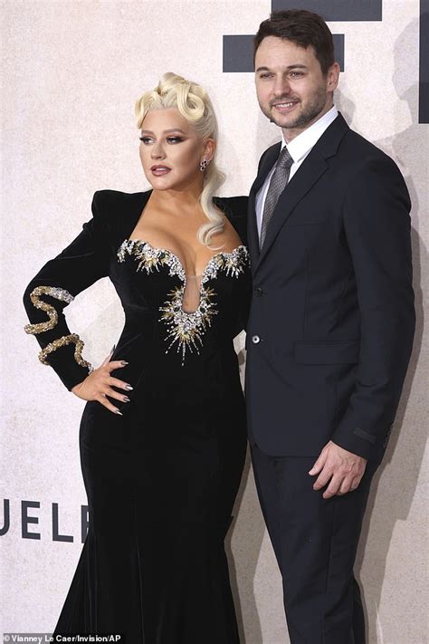Christina Aguilera Puts On A Very Busty Display In A Plunging Gown At