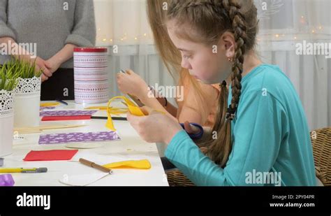 Girls At The Lesson With The Teacher Sew A Soft Toy With Their Own Hands Stock Video Footage Alamy
