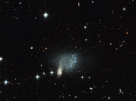 Hubble Image Shows Distant Galaxies Colliding