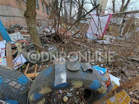 Последствия обстрела Петровского района Донецка украинскими боевиками