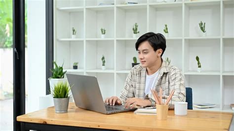 Premium Photo Smart Asian Man Or Male Freelancer Using Laptop Working