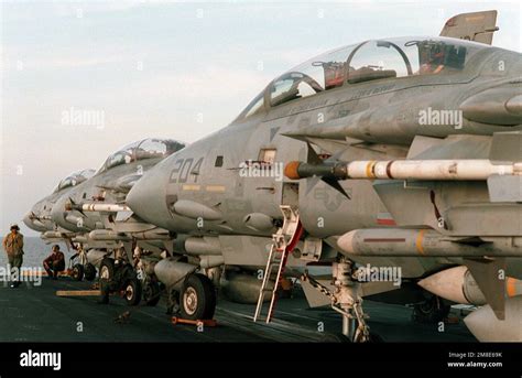 Three Fighter Squadron 103 Vf 103 F 14a Tomcat Aircraft Sit Armed And