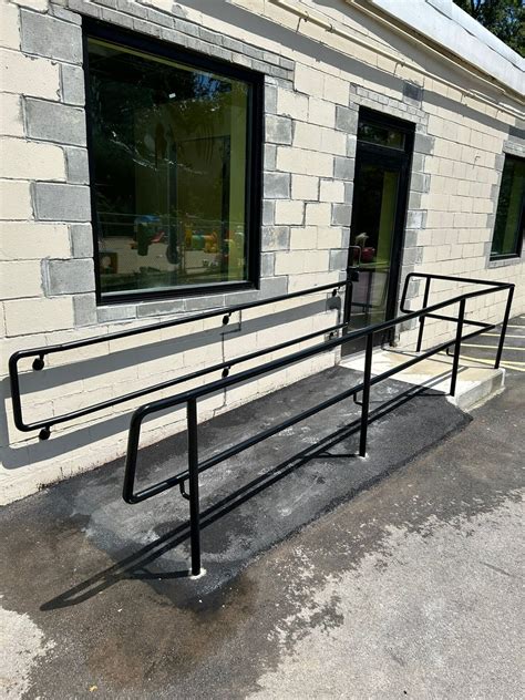 ada ramp railings by master iron works ensuring safety and accessibility