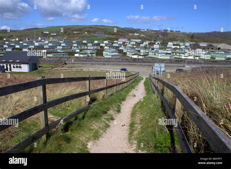 Sandy Footpath With Wooden Railings Leading Back From Owenahincha Beach