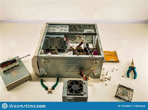 Process Of Computer Repairing With A Disassembled Computer Case Stock