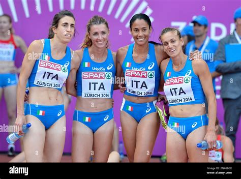 Italys Team Pose For A Photograph After The Womens 4x400m Relay Final