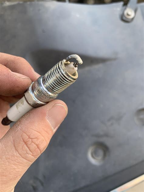 Spark plug burning : r/MechanicAdvice