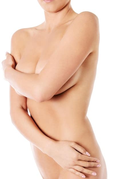 Premium Photo Midsection Of Naked Woman Standing Against White Background