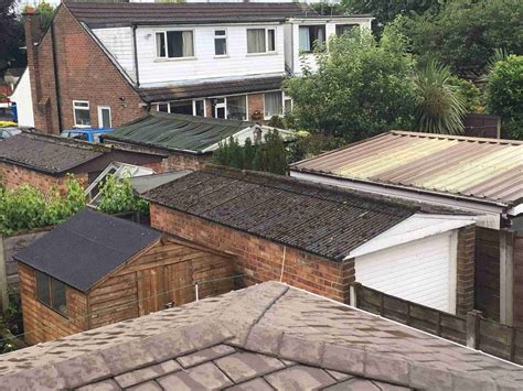 How To Spot Asbestos In Your Garage Roof And When To Replace It