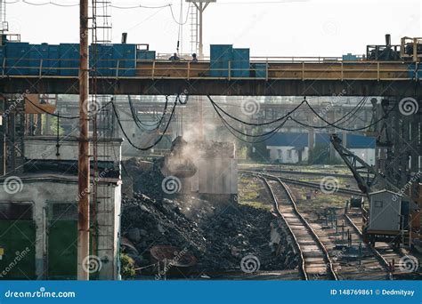 Loading Iron Ore In Container By Bucket On Metallurgy Heavy Industry