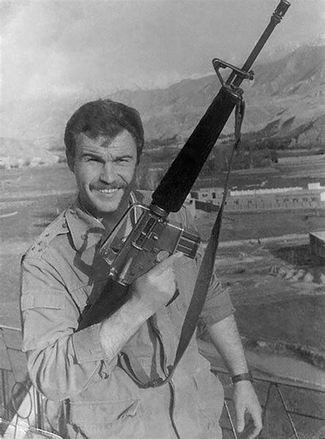 A Captain in the Soviet 40th Army poses with a captured M1… | Flickr