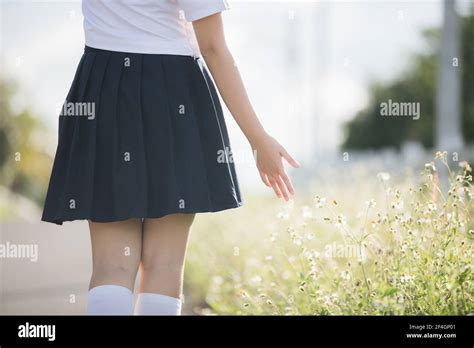 Portrait Of Asian Japanese School Girl Costume Looking At Park Outdoor
