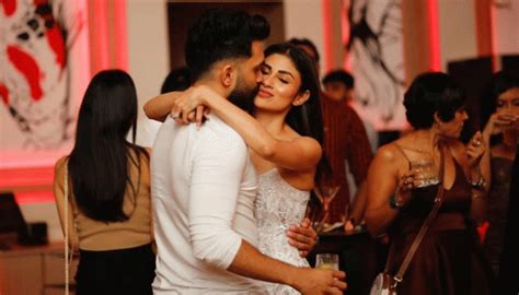 Naagin Actress Mouni Roy Gets Romantic Kiss From Hubby Suraj Nambiar
