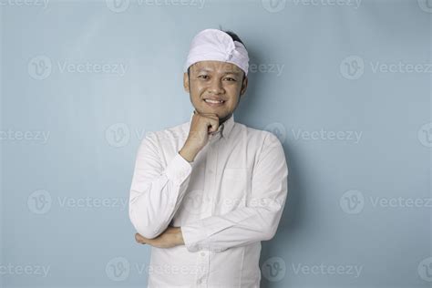 Portrait Of A Thoughtful Young Balinese Man Wearing Udeng Or