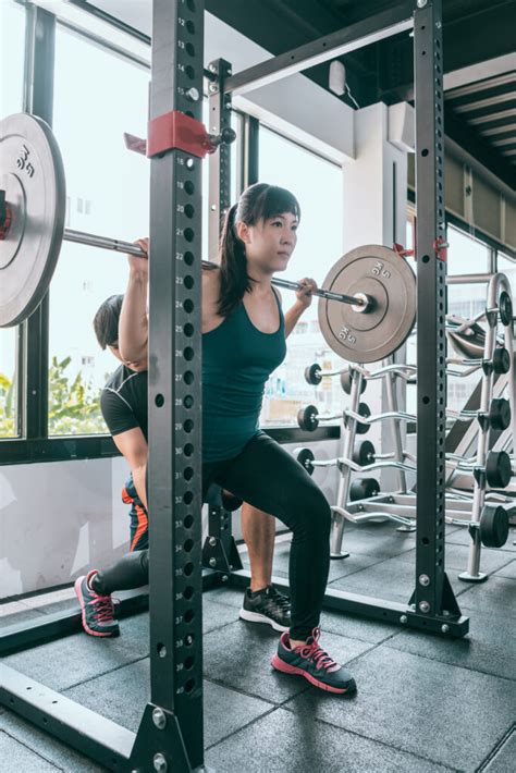 Smith Machine Vs Squat Rack Which Is Best For Your Workout Routine