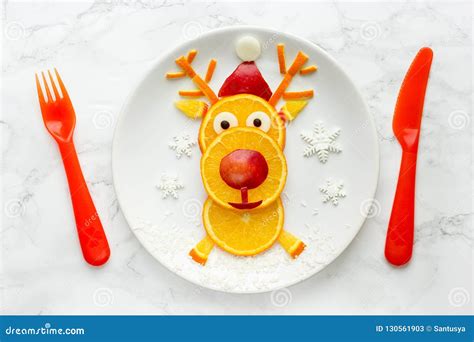 Fun Christmas Food Art Idea Edible Reindeer From Orange Slices Stock