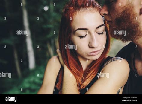Guy Hugging His Girlfriend Stock Photo Alamy