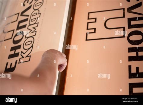 Laying Polystyrene Foam Penoplex On The Floor Insulation Of The Floor Surface In The House With