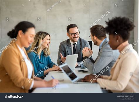 Successful Business Professionals Presenting Analytical Report Stock