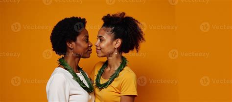 Two Stylishly Dressed Young Africanamerican Lesbians Stand Together