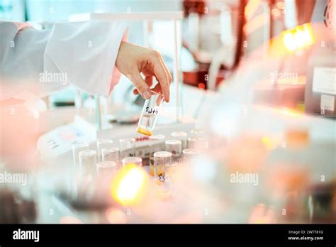 Labratory Scientist Extracting Dna And Biological Material For Testing