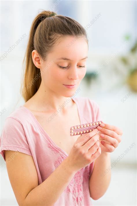 Woman Holding Oral Contraception Pills Stock Image C0350908