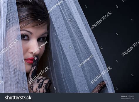 Closeup Portrait Of Beautiful Girl With Red Lips In White Fabric On