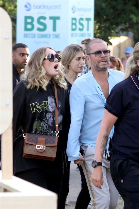 Adele Shows Off Slimmer Figure As She Holds Hands With Male Pal Us Weekly