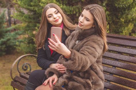 Two Girls Are Taking Selfie With Smartphone Stock Image Image Of
