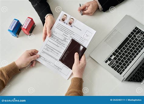 Man Applying For Visa In Immigration Office Stock Image Image Of
