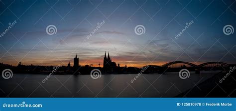 Panorama Of Cologne Skyline Silhouette At Sunrise Stock Photo Image