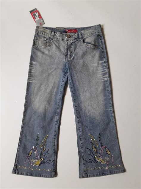 Укорочені джинси розкльошені кюлоти — ціна 100 грн у каталозі Джинси