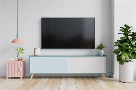 파란색 벽 배경 3d 렌더링에 현대 거실의 캐비닛에 Tv 프리미엄 사진