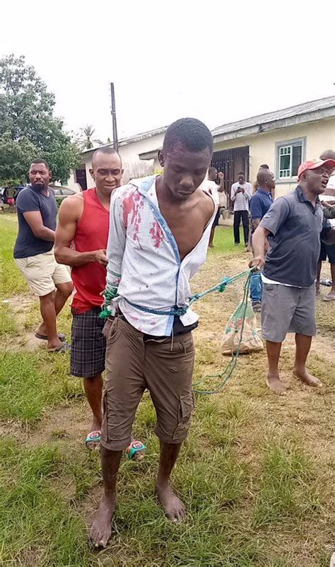 Suspected Thief Caught Beaten And Tied Up In Calabar Toptipz