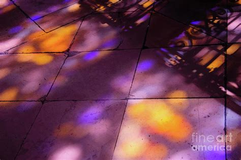 Stained Glass Window Light Reflection On Church Floor Purple Orange