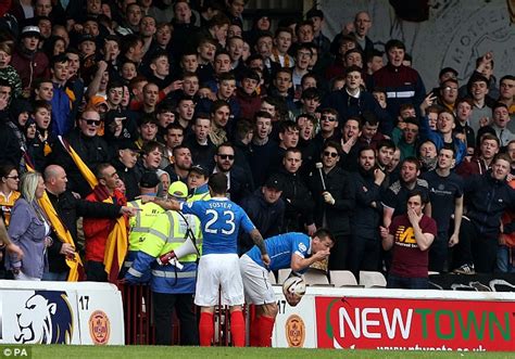 Lee Mcculloch Struck In The Face By A Motherwell Supporters Flag During The Play Off Second Leg