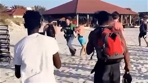 Spring Breaker Handcuffed But Flees From Cops Beach Crowd Cheers Him On