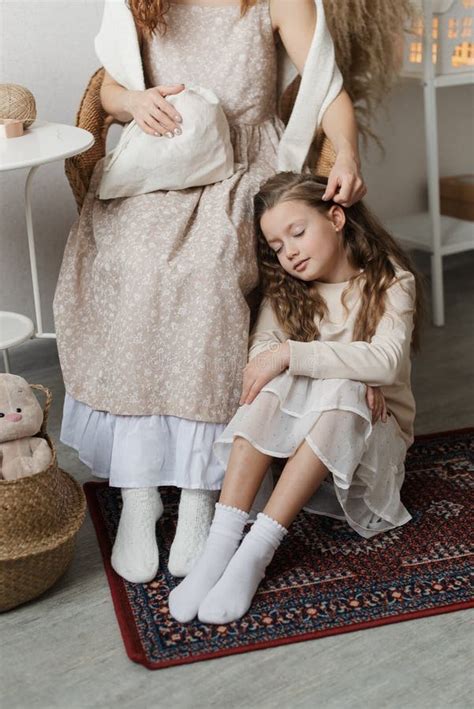 Mom Gently Strokes Her Daughter S Wavy Hair Stock Image Image Of