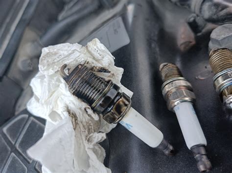2009 Audi A4 1.8tfsi. Oil on the fourth spark plug? What should I do ...