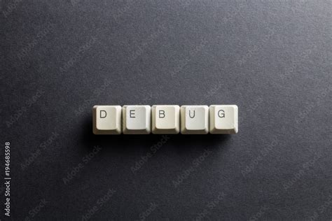 Word Debug Made Using Computer Keyboard Buttons On A Black Background