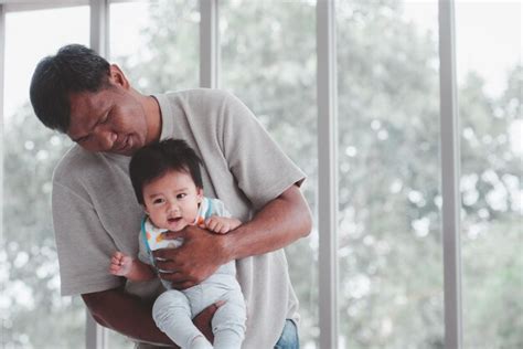 Premium Photo Portrait Of Father And Son