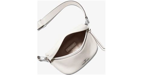 Michael Kors Slater Extra Small Pebbled Leather Sling Pack In Natural