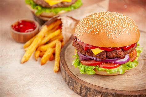 Premium Photo Front View Delicious Cheeseburgers With French Fries On