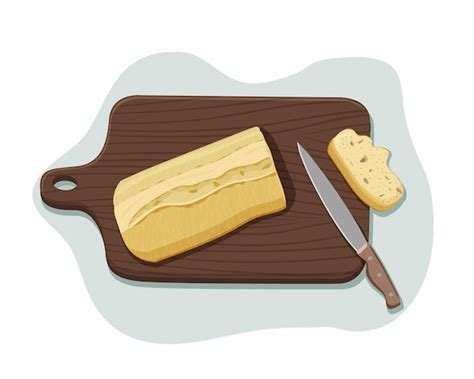 Hogaza De Pan Blanco Fresco Sobre Una Tabla Para Cortar Madera Con Una