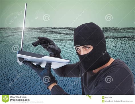 Hacker With Hood Using A Laptop In Front Of Digital Number Field Stock Image Image Of Cyber